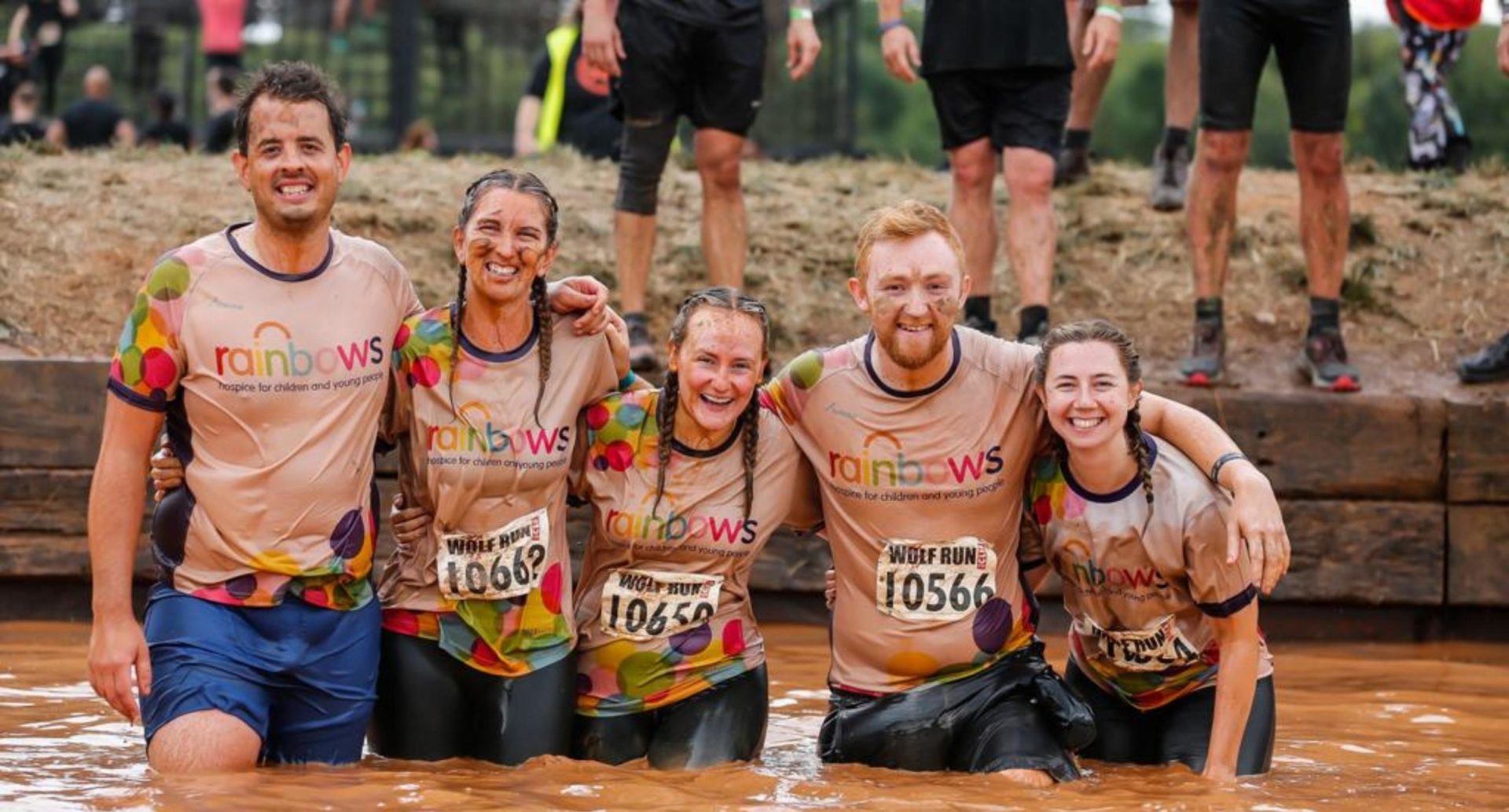 Loughborough colleagues get muddy for Rainbows | Rainbows Hospice